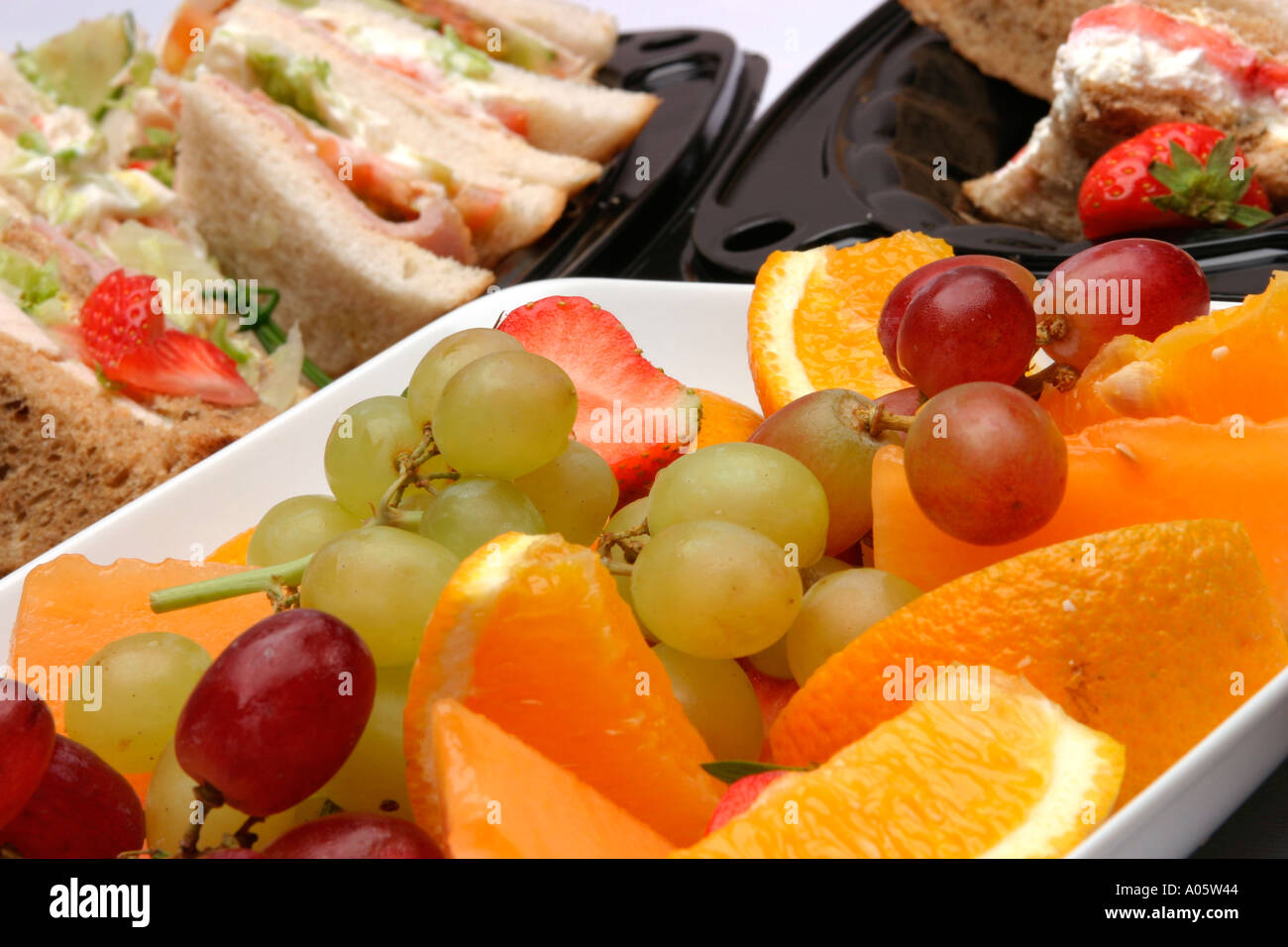 Food healthy eating lunch plate of fruit and sandwiches Stock Photo - Alamy