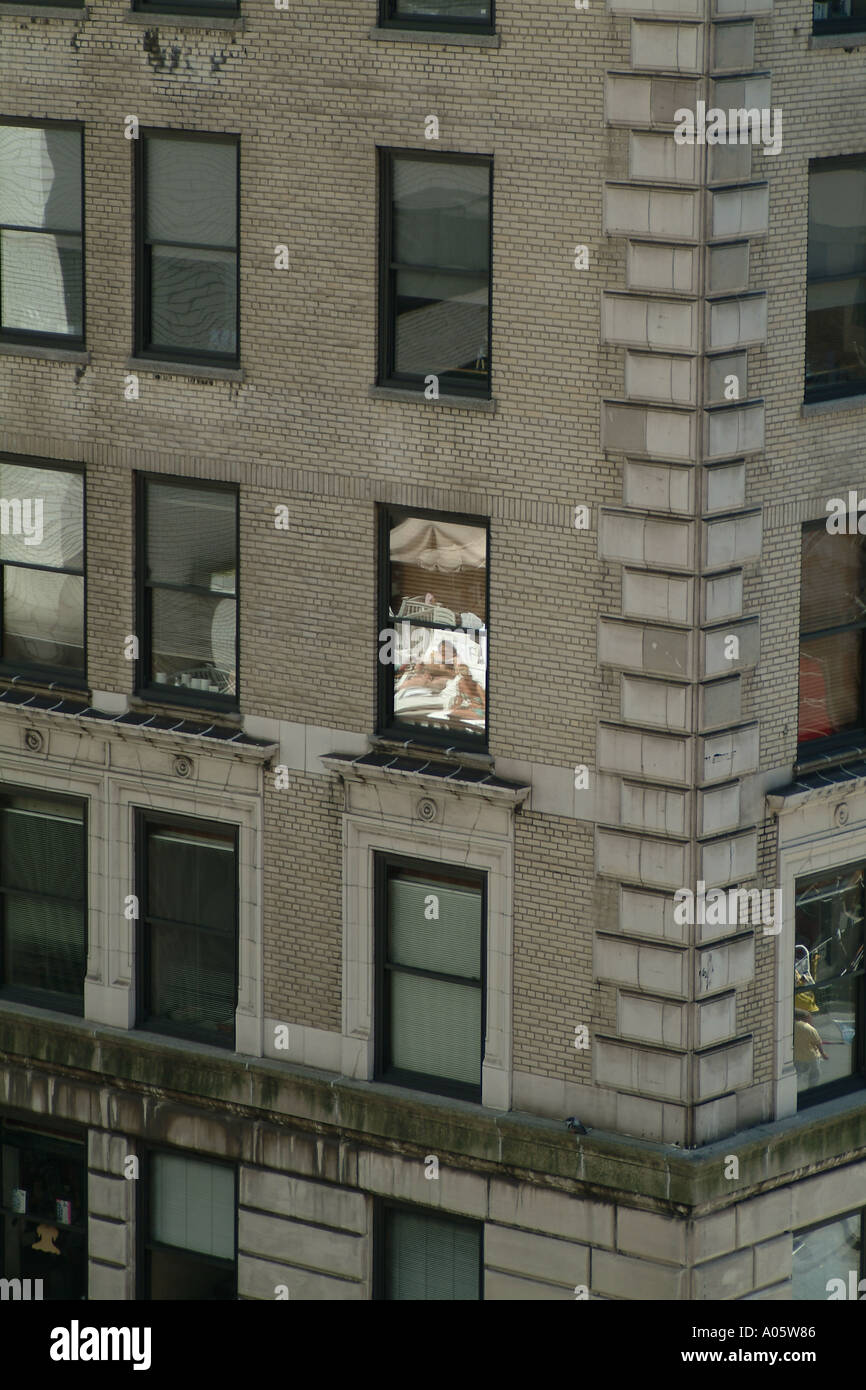 Woman sunbathing rooftop hi-res stock photography and images - Alamy