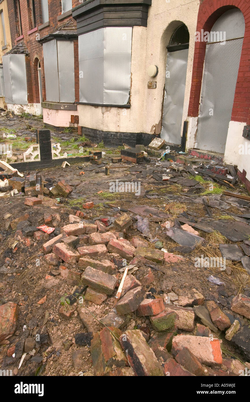 a row of abandoned, derelict houses in Manchester, England Stock Photo ...