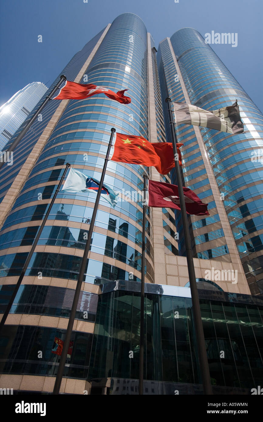 Modern office building with flags of China and Hong Kong in the ...