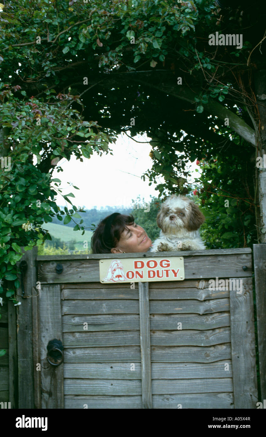 Dog by gate hi-res stock photography and images - Alamy