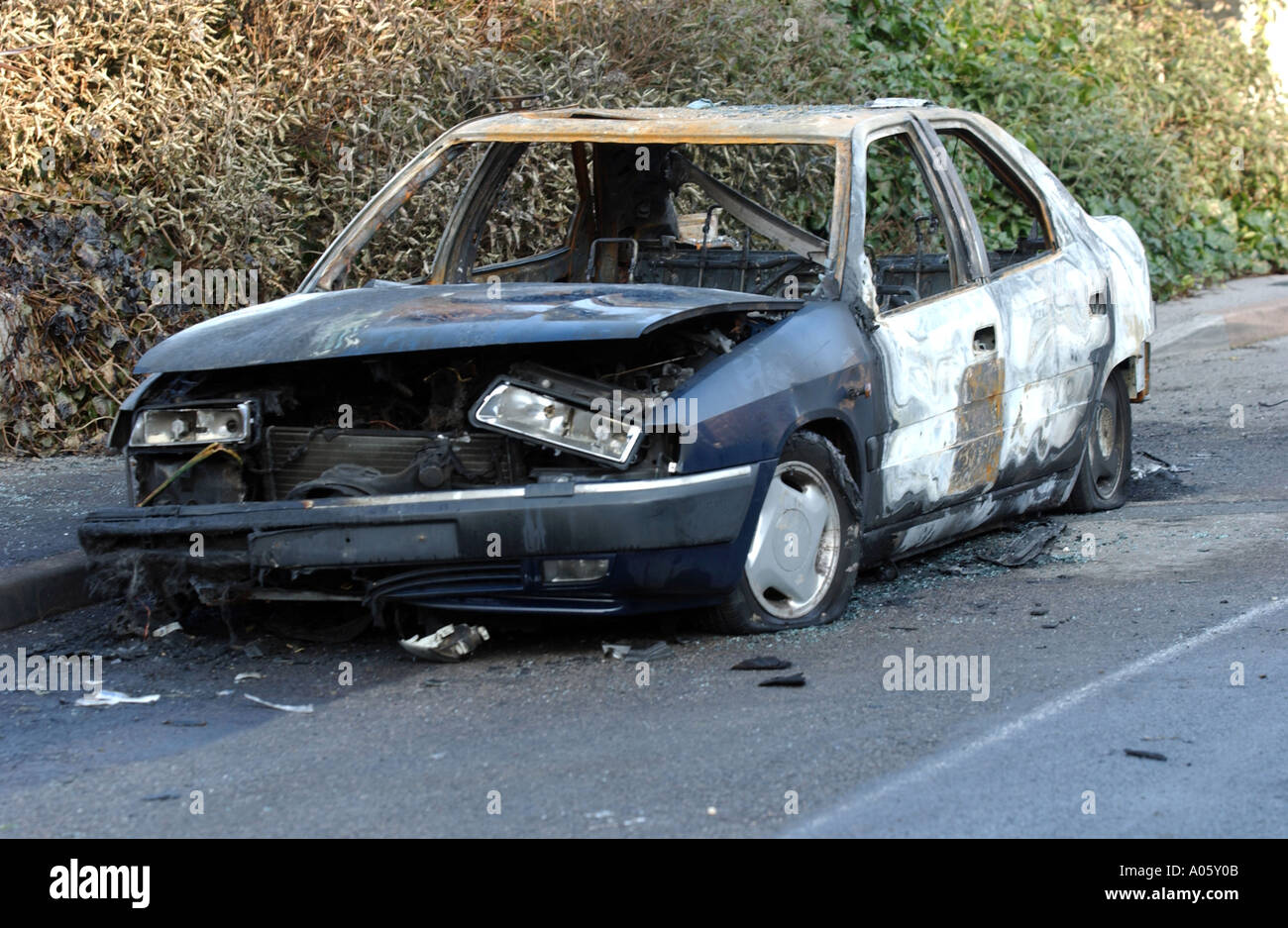 Burnt out car on road hi-res stock photography and images - Alamy