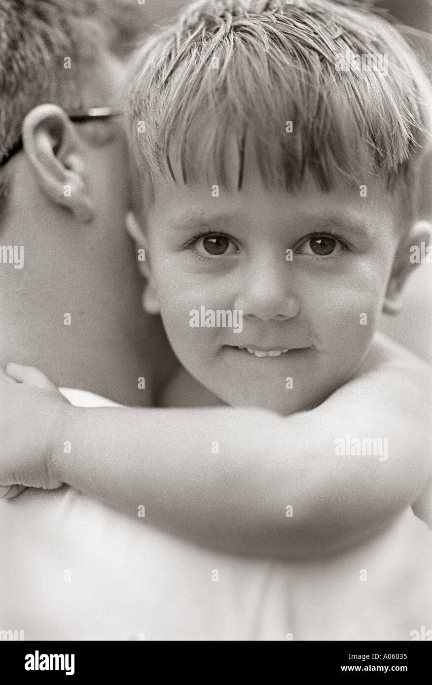 mischievious boy on dad s shoulder Stock Photo - Alamy