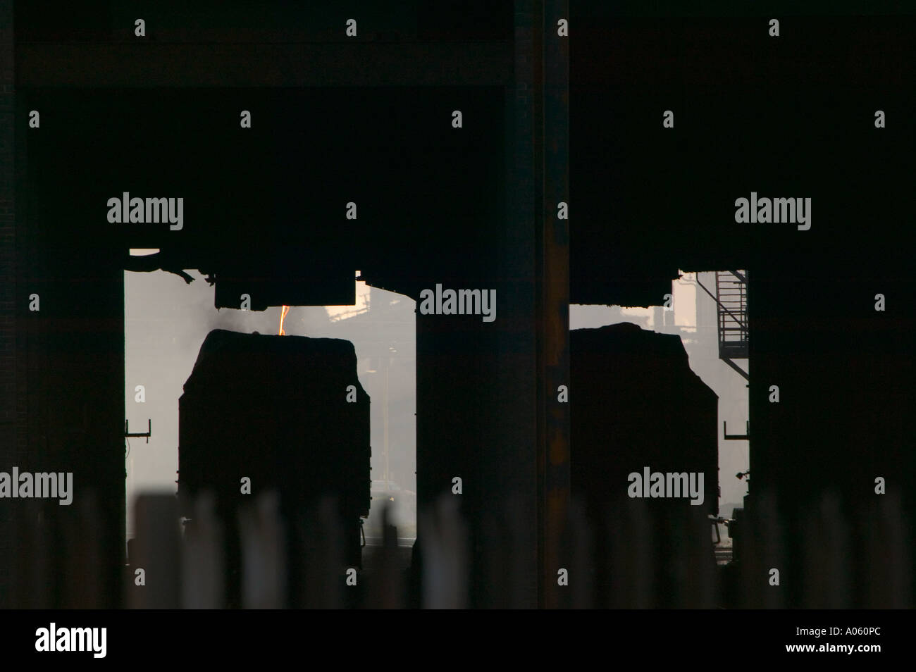 molten steel being poured into a transport train at the Corus ...