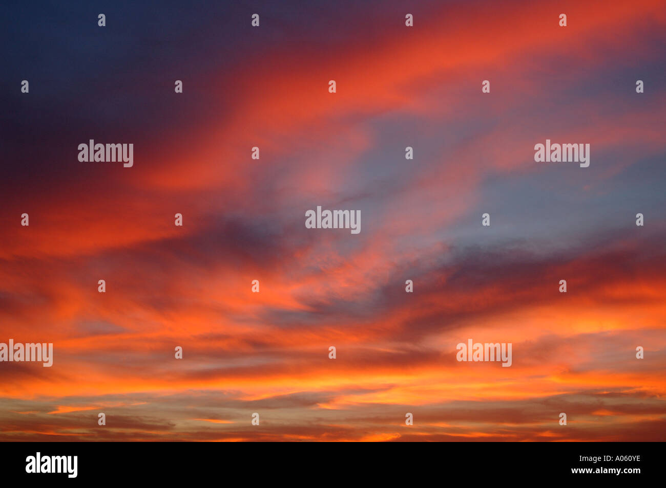 Sunset reflecting shades of pink onto stratocumulus clouds Stock Photo ...