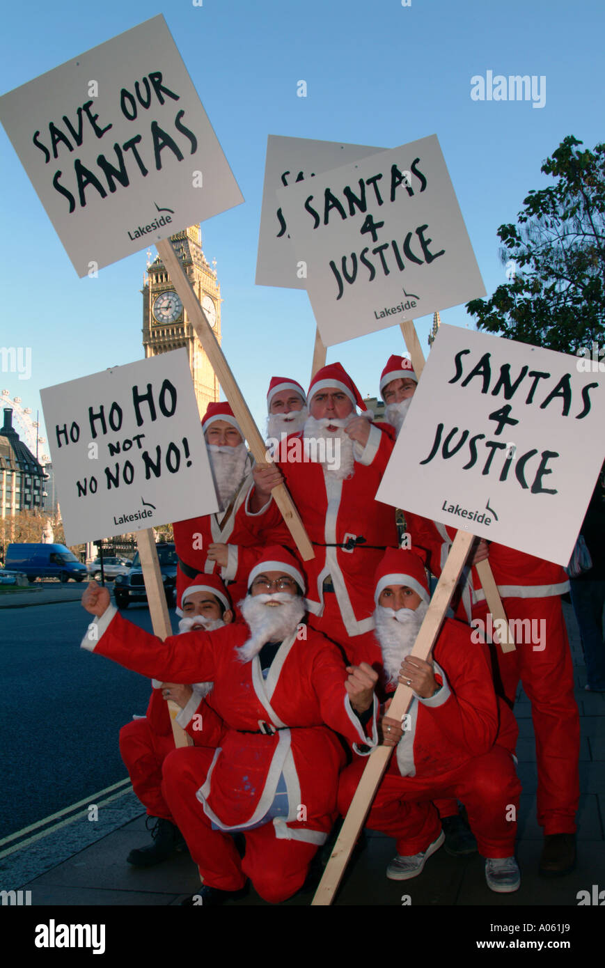 Santas outside Houses of Parliament protesting at bans on traditional ...