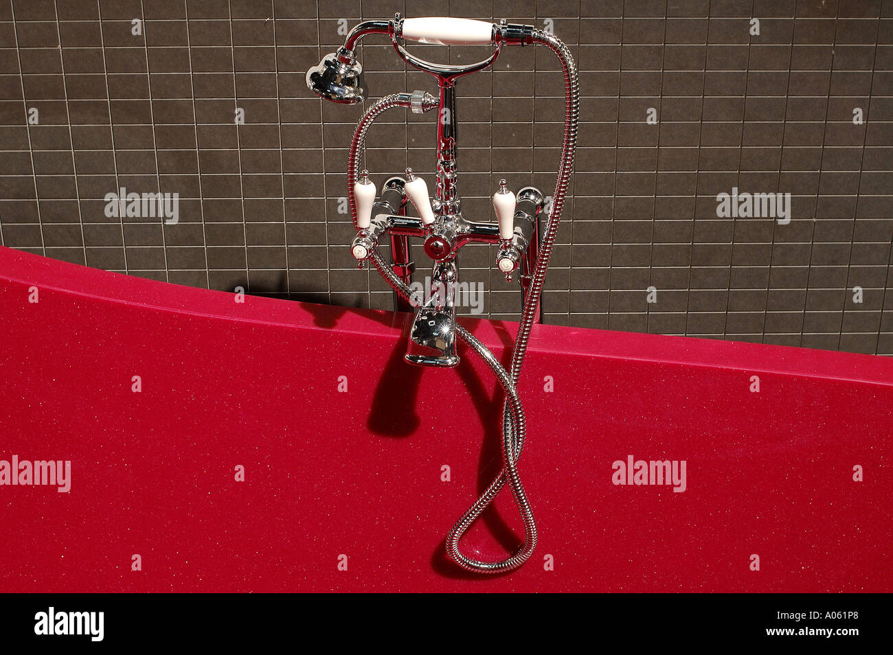 Elegant combined tap and shower unit in a stylish bathroom Stock Photo ...