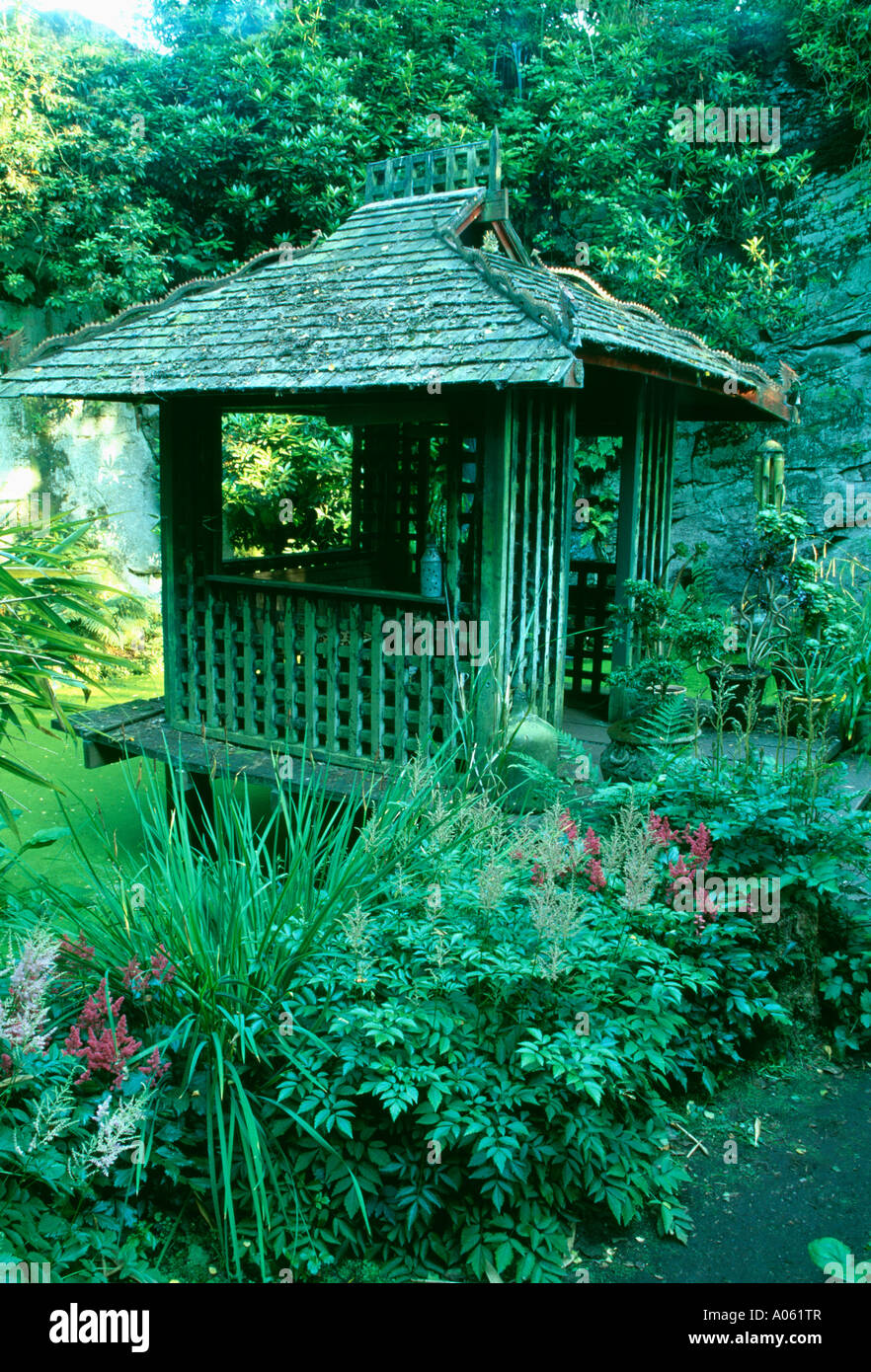 Wooden gazebo in country garden Stock Photo - Alamy