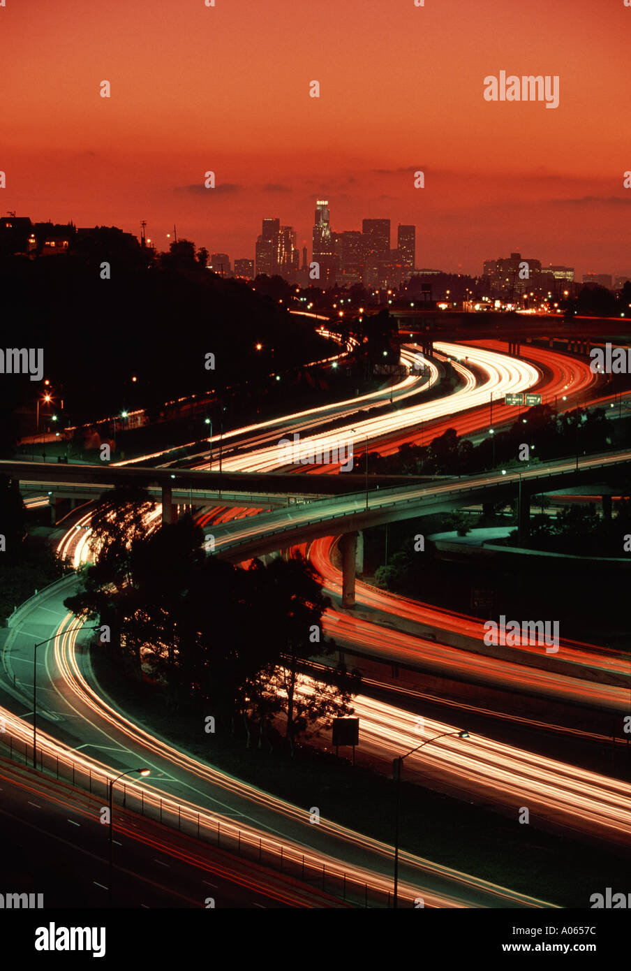 Los Angeles skyline and freeways at sunset Los Angeles California USA ...