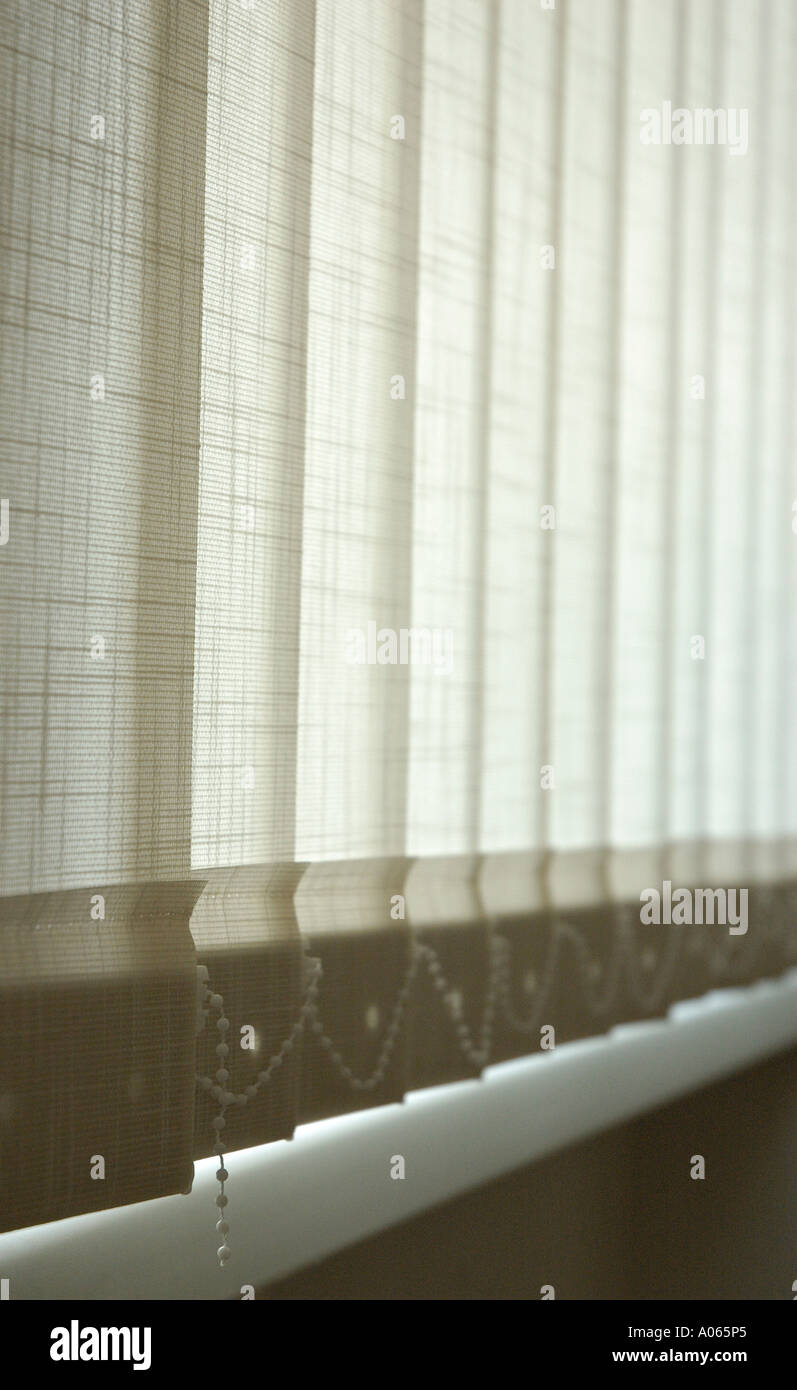 Side view of an elegant curtain is seen with beads attached at its ...