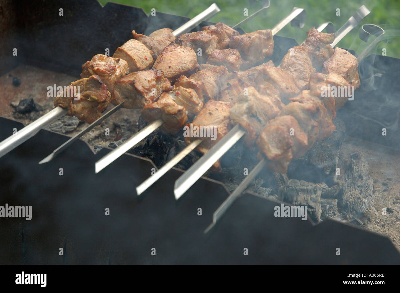 Pieces of meat are seen roasted on the skewer Stock Photo - Alamy