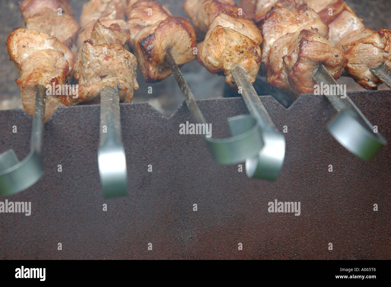 Front view of pieces of meat seen roasted on the skewer Stock Photo - Alamy
