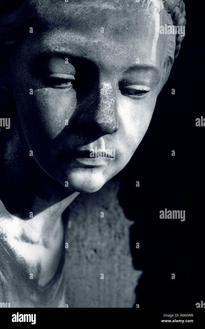 A grayscale image of statue of a boy Stock Photo - Alamy