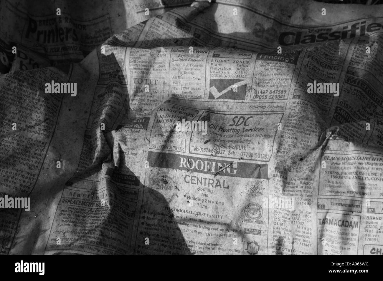Crumpled newspaper Black and White Stock Photos & Images - Alamy