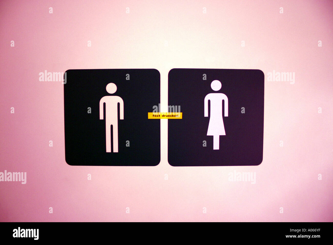 Symbolic representation of male and a female figure having a shaded ...