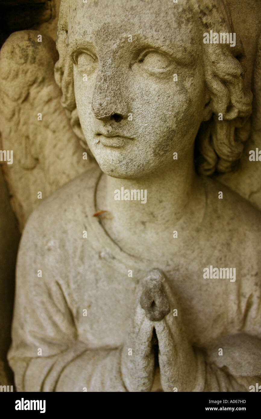 Close up of a statue with joined hands Stock Photo - Alamy