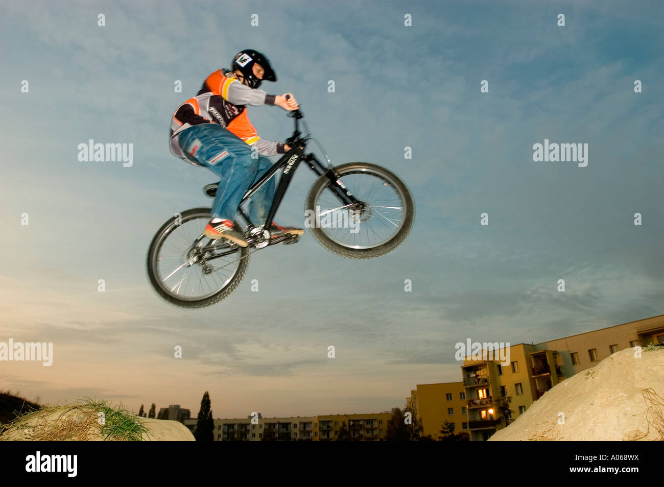 Man on bike jumping from hop Stock Photo - Alamy