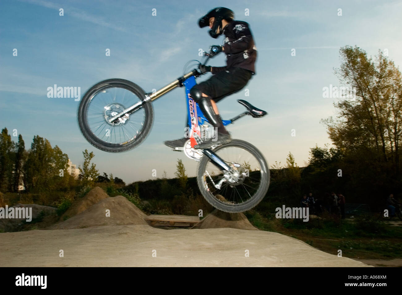 Man on bike jumping from hop Stock Photo - Alamy