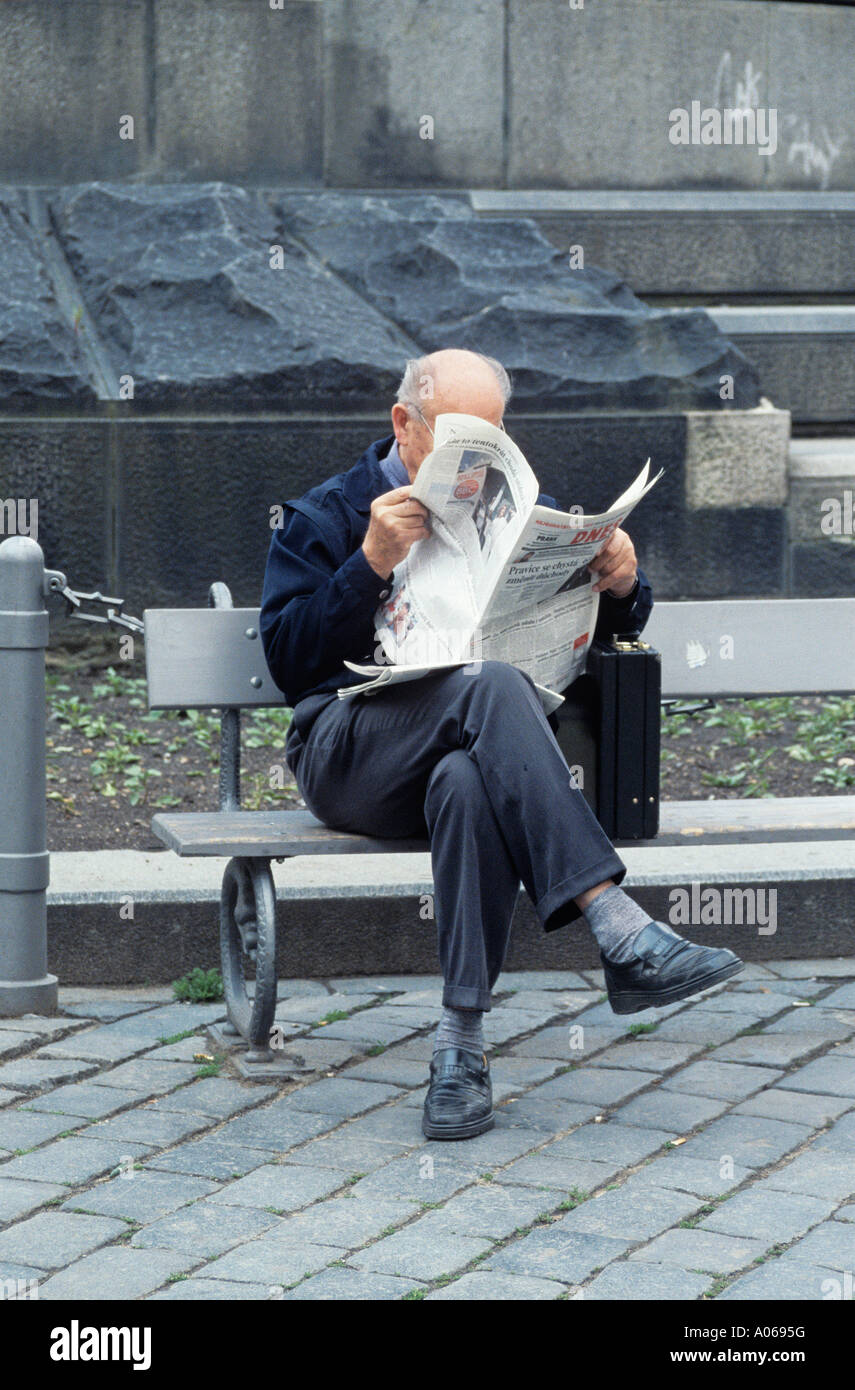 Old man reading Dnes newspaper Stock Photo - Alamy
