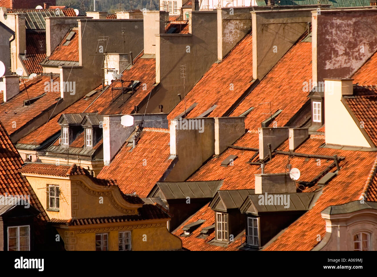 Red rooftops of heritage houses in UNESCO Old Town blue sky Warsaw ...