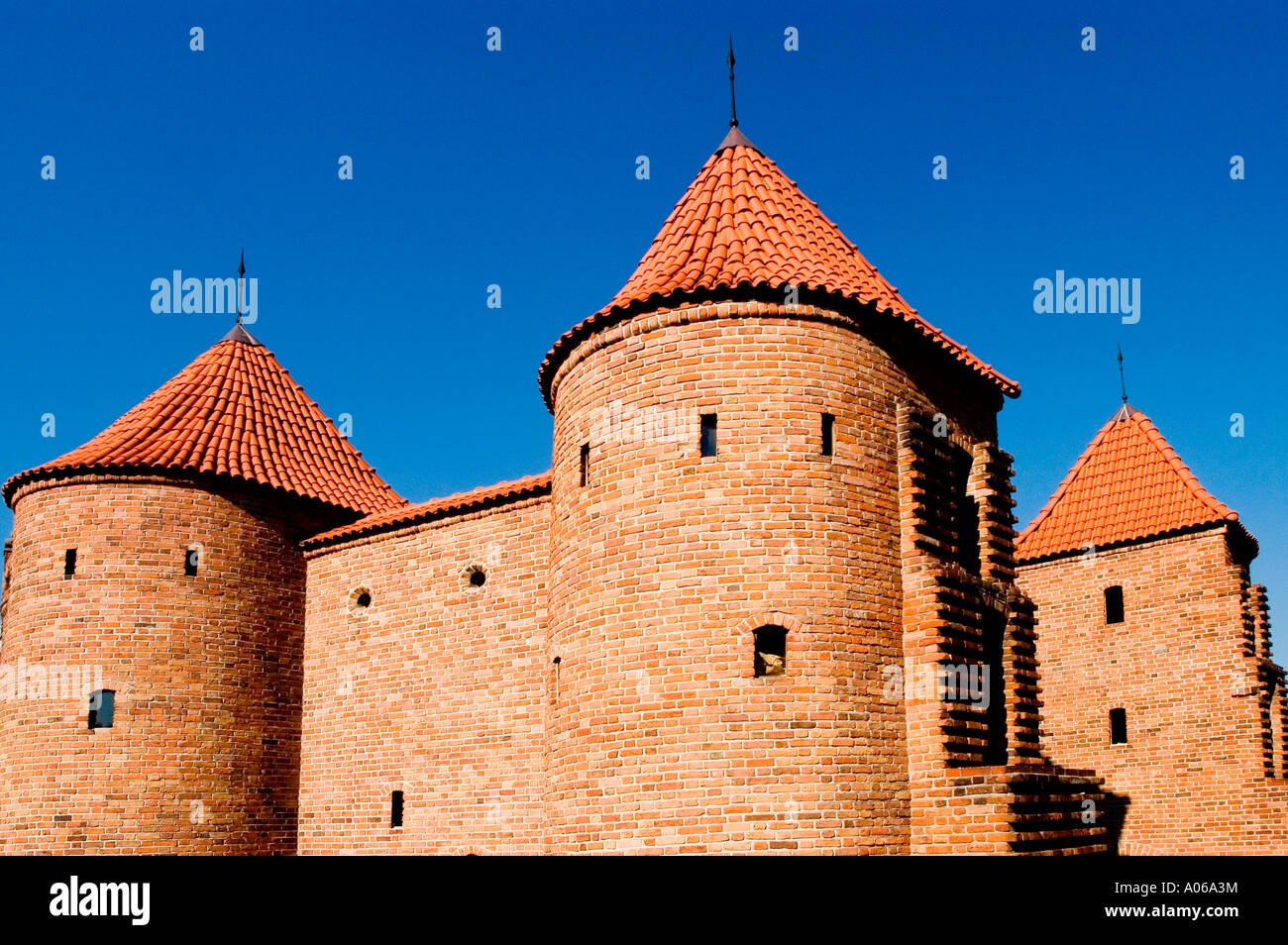 Barbican aka Barbakan medieval defence walls with towers and red tiles ...