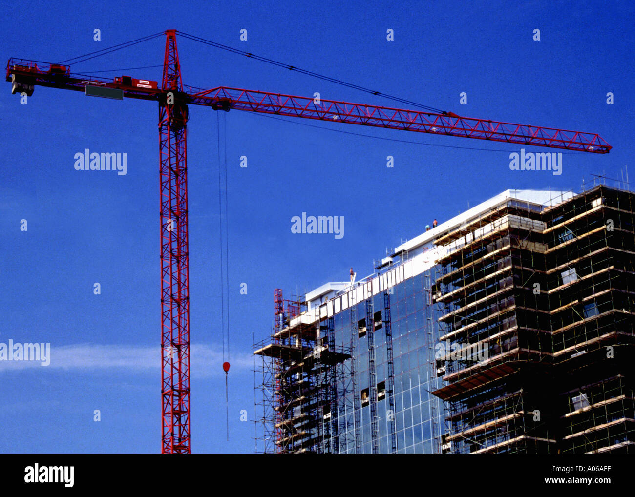 Construction and tower crane Stock Photo - Alamy