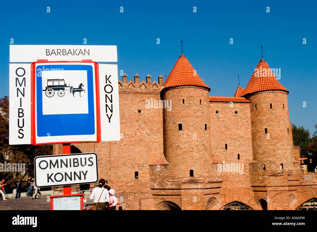 Horse cab stop near Barbican aka Barbakan medieval defence walls with ...