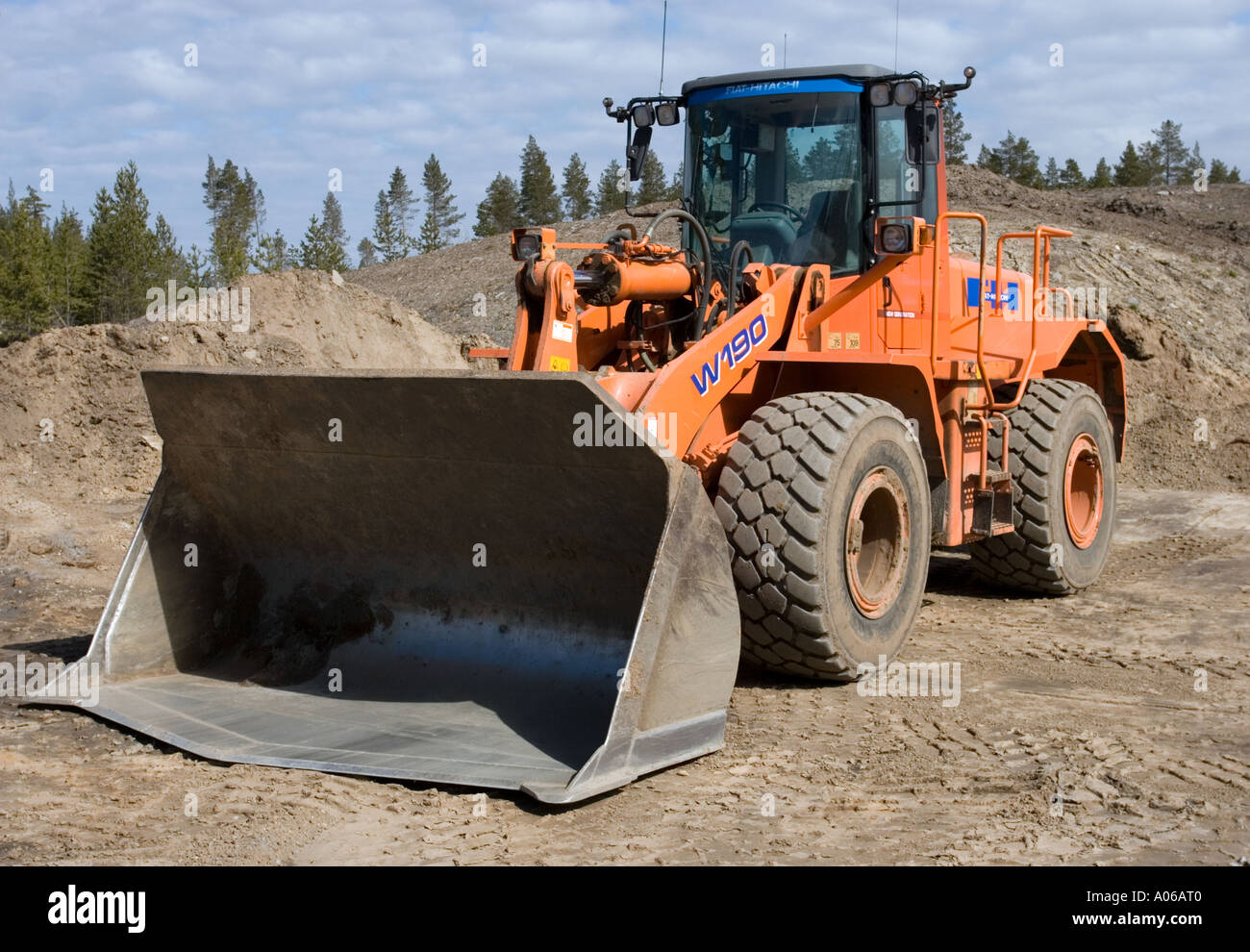 Orange colored Hitachi W190 earth-mover , Finland Stock Photo - Alamy
