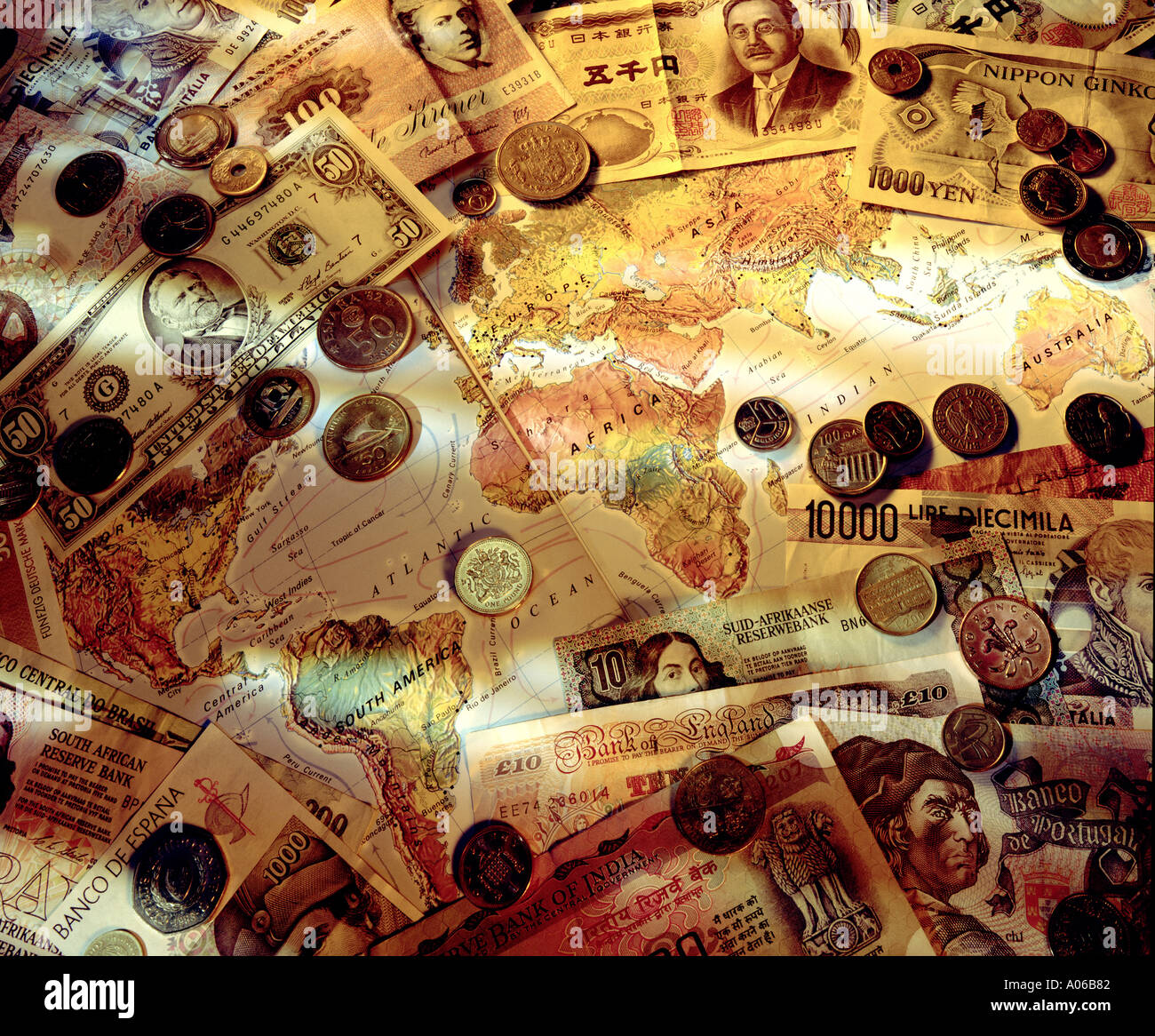 Coins and banknotes on world map Stock Photo - Alamy