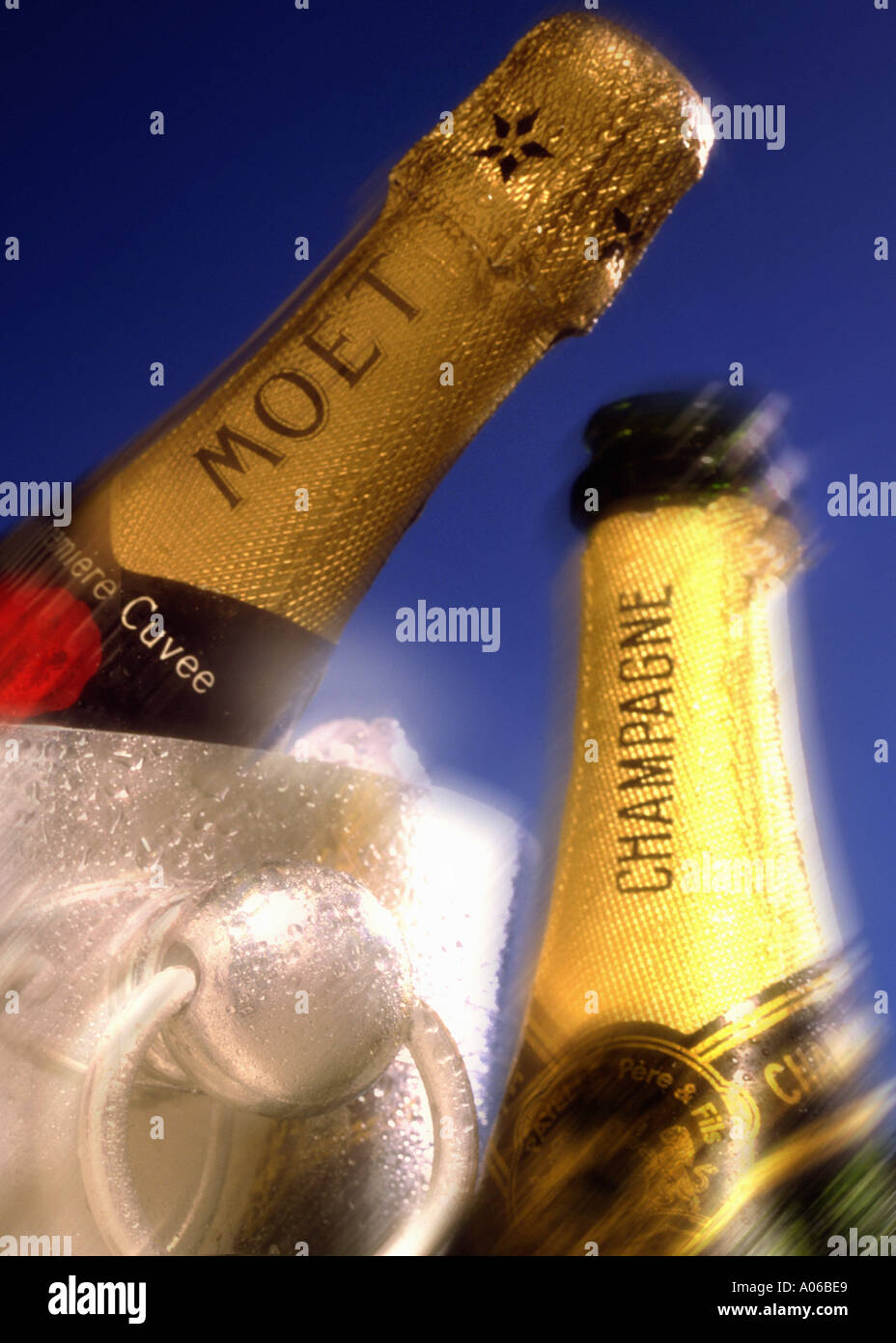 Cold champagne bottles in ice bucket Stock Photo - Alamy