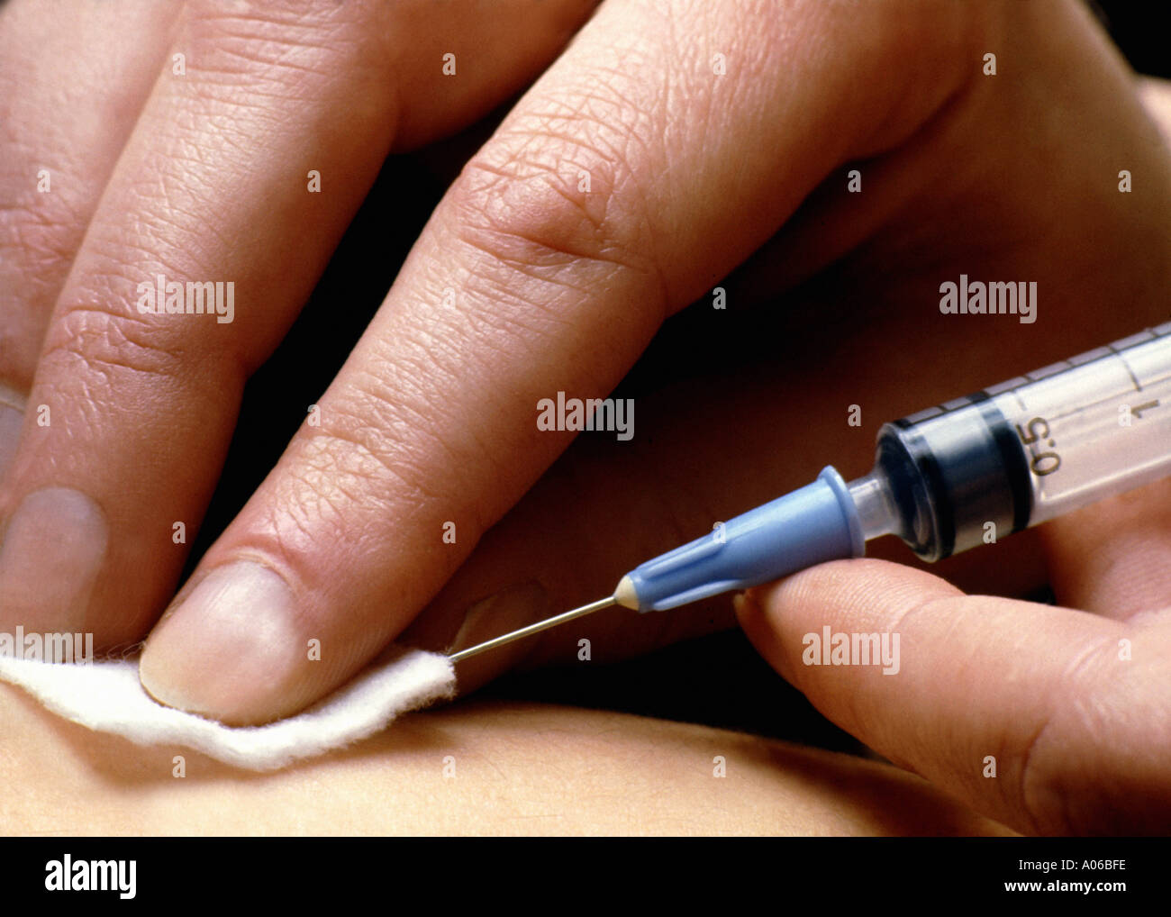 Medicine giving an injection Stock Photo - Alamy