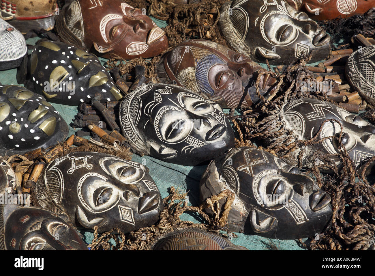 carved wooden masks on a stall in Hermanus market South Africa Stock ...