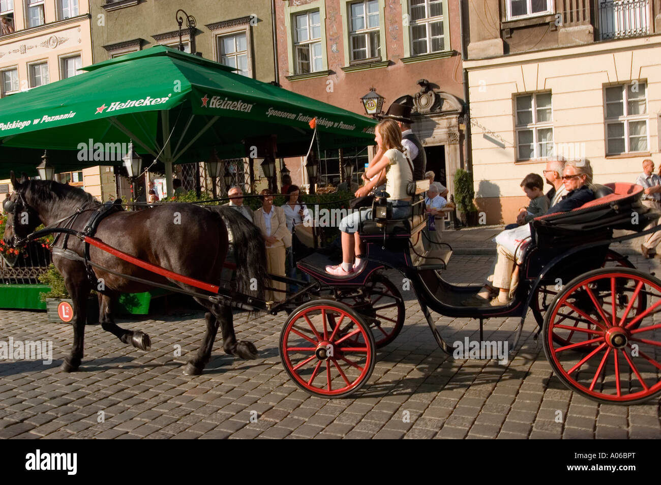Tourist horse cab on Old Market Square Poznan Poland Stock Photo - Alamy