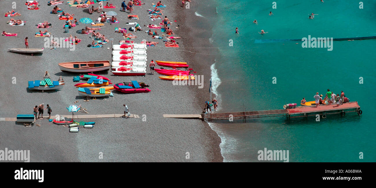 Positano Amalfi Coast Italy Mediterranean People sunbaking on the beach ...