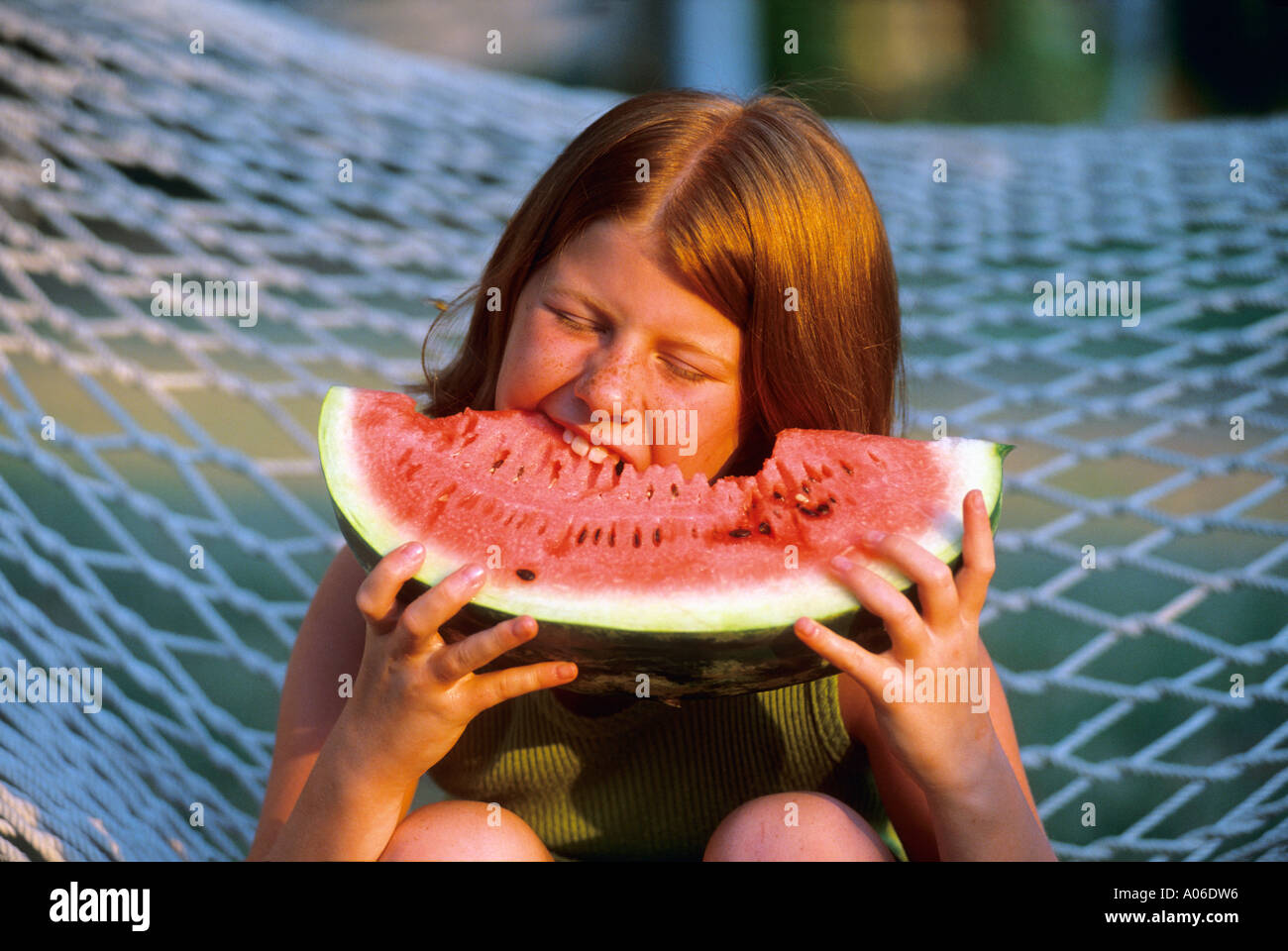 GIRL EATING A WATERMELON Stock Photo - Alamy