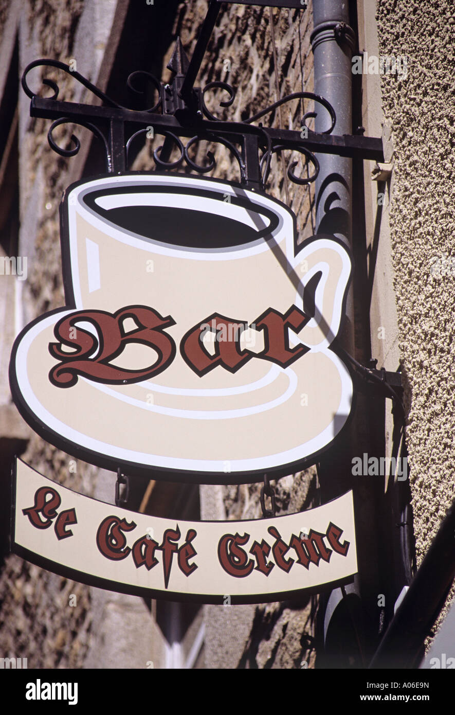 Detail of a café sign shaped as a cup of coffee in Normandy Stock Photo ...