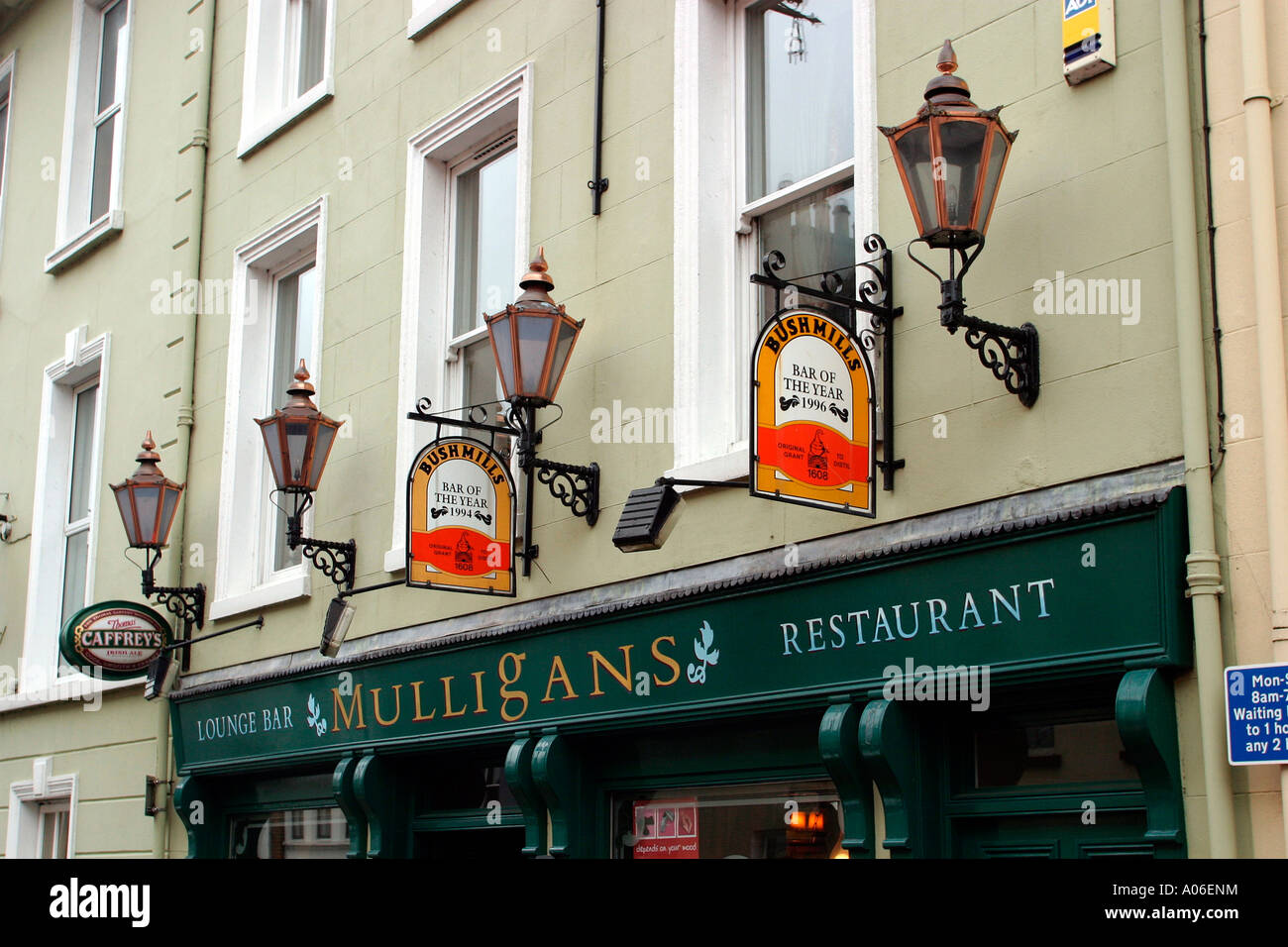 County Fermanagh Enniskillen High Street Mulligans Bar sign Stock Photo ...