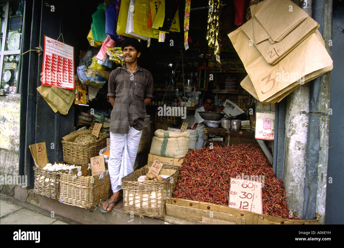 Sri Lanka Kandy shopkeeper in general store Stock Photo - Alamy