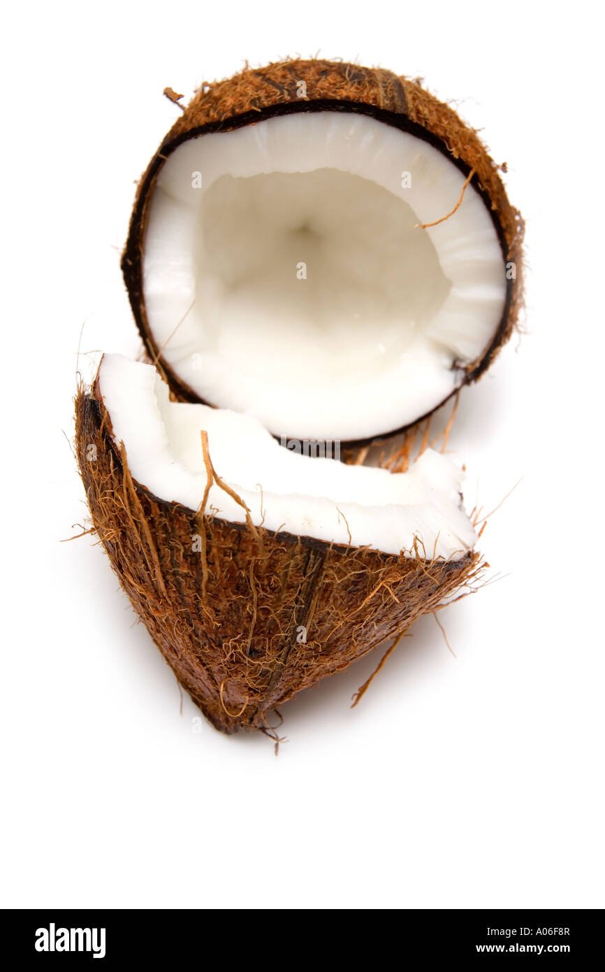 Coconut halved isolated on a white studio background Stock Photo - Alamy