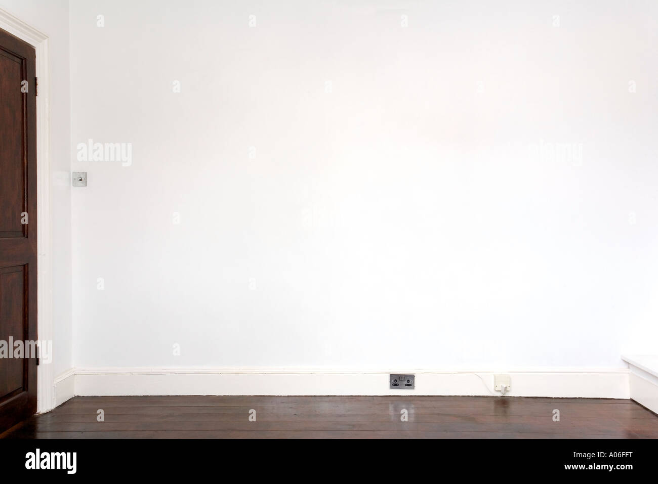 Blank white studio gallery wall Stock Photo - Alamy