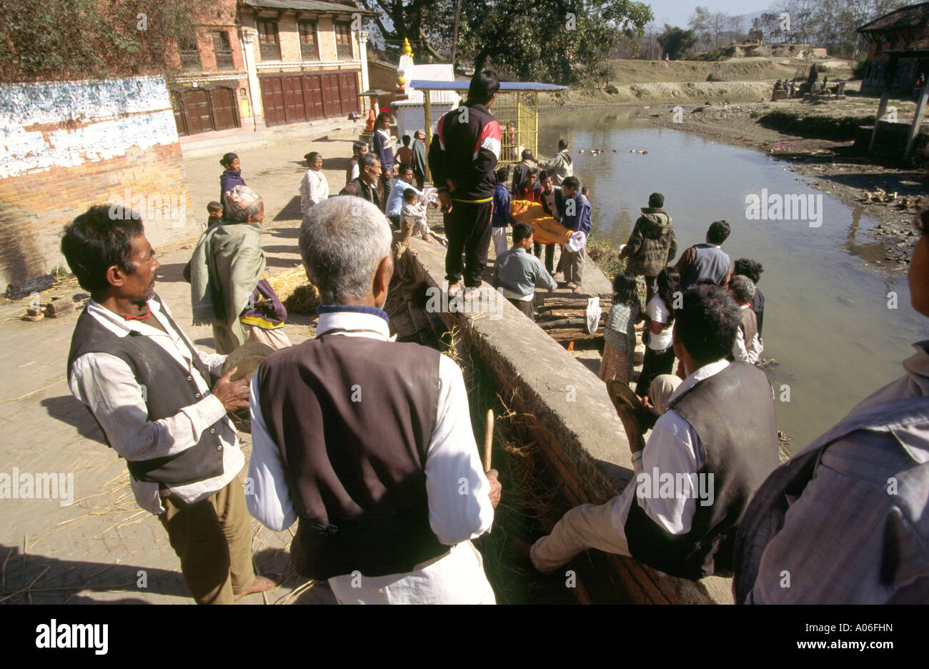 Nepal Bhaktapur cremation party at Hanuman Ghat on Hanumante river ...