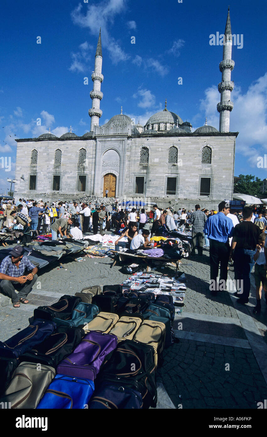 Slender minarets flank the familiar domed structure of the Yeni Cami ...