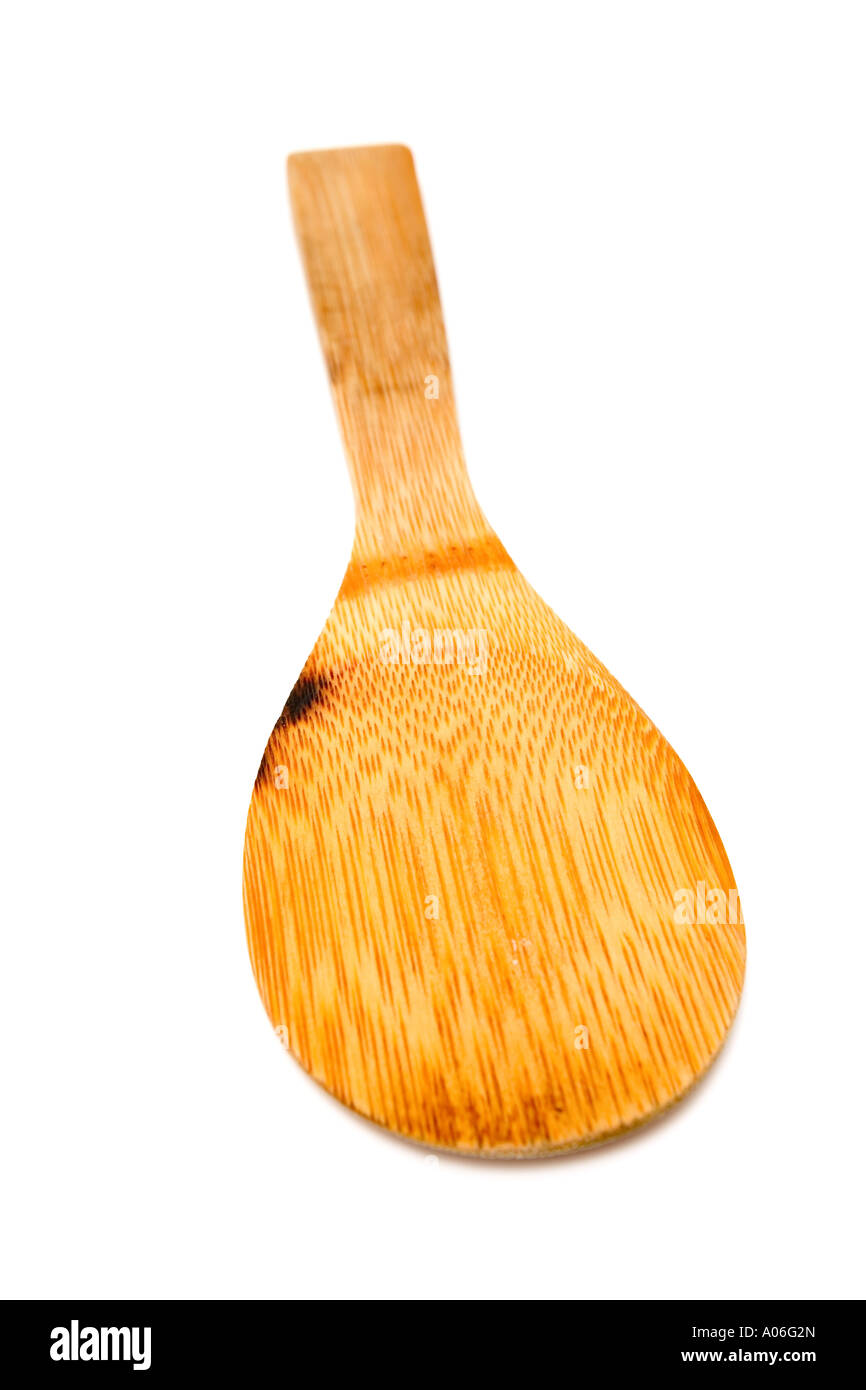Wooden spoon isolated on a white studio background Stock Photo - Alamy