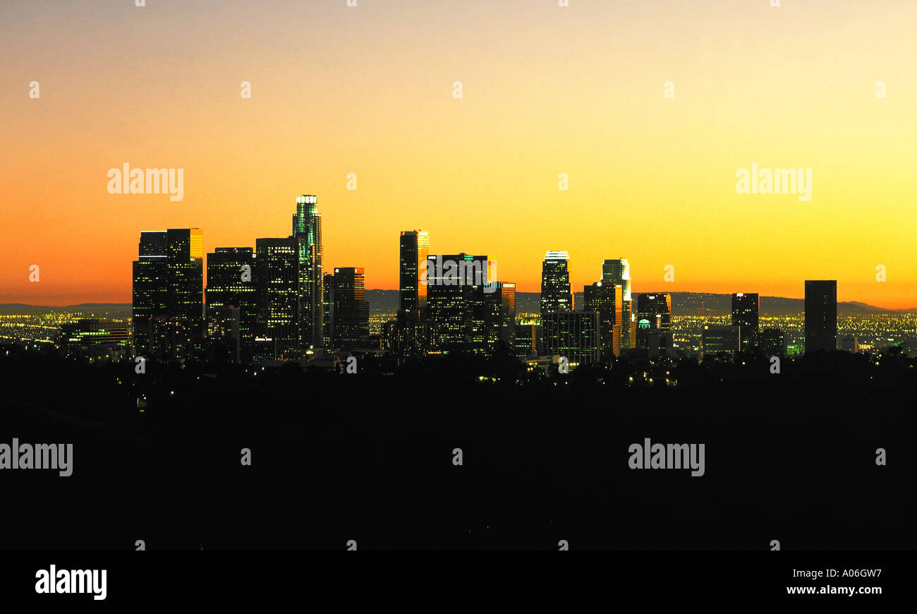 The sky takes on intense colors as the sun sets over Los Angeles ...
