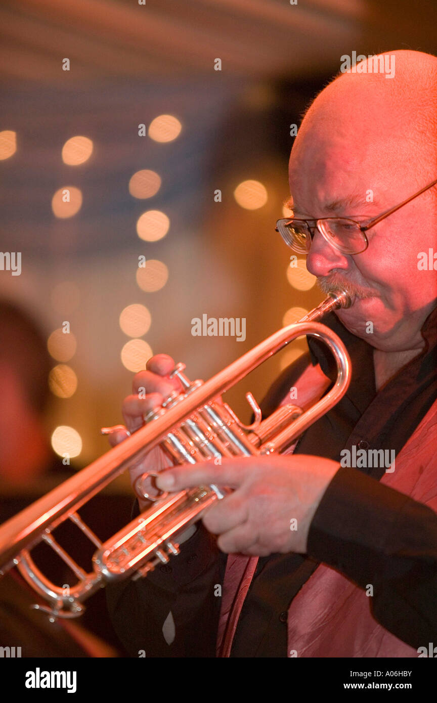 a trumpet player in a band Stock Photo - Alamy