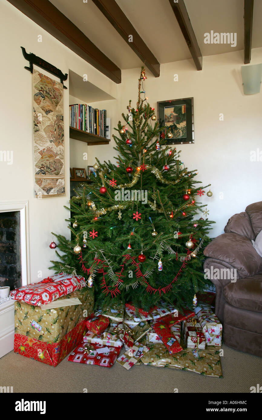 Christmas Xmas tree indoors in a living room with decorations and ...