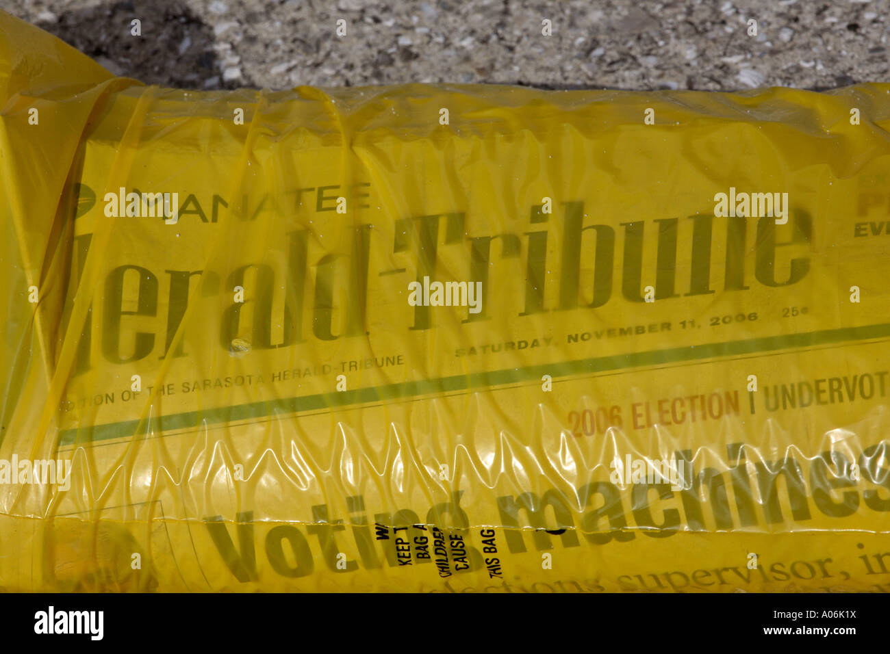 Plastic wrapped newspaper in Florida USA Stock Photo - Alamy