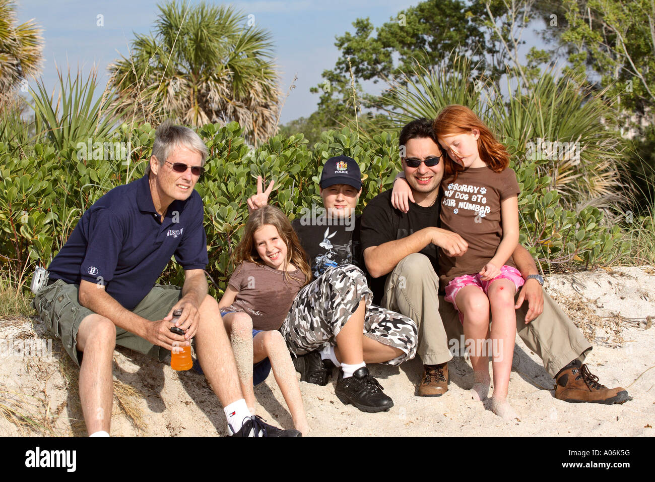 Family group enjoying the beach in Florida Stock Photo - Alamy