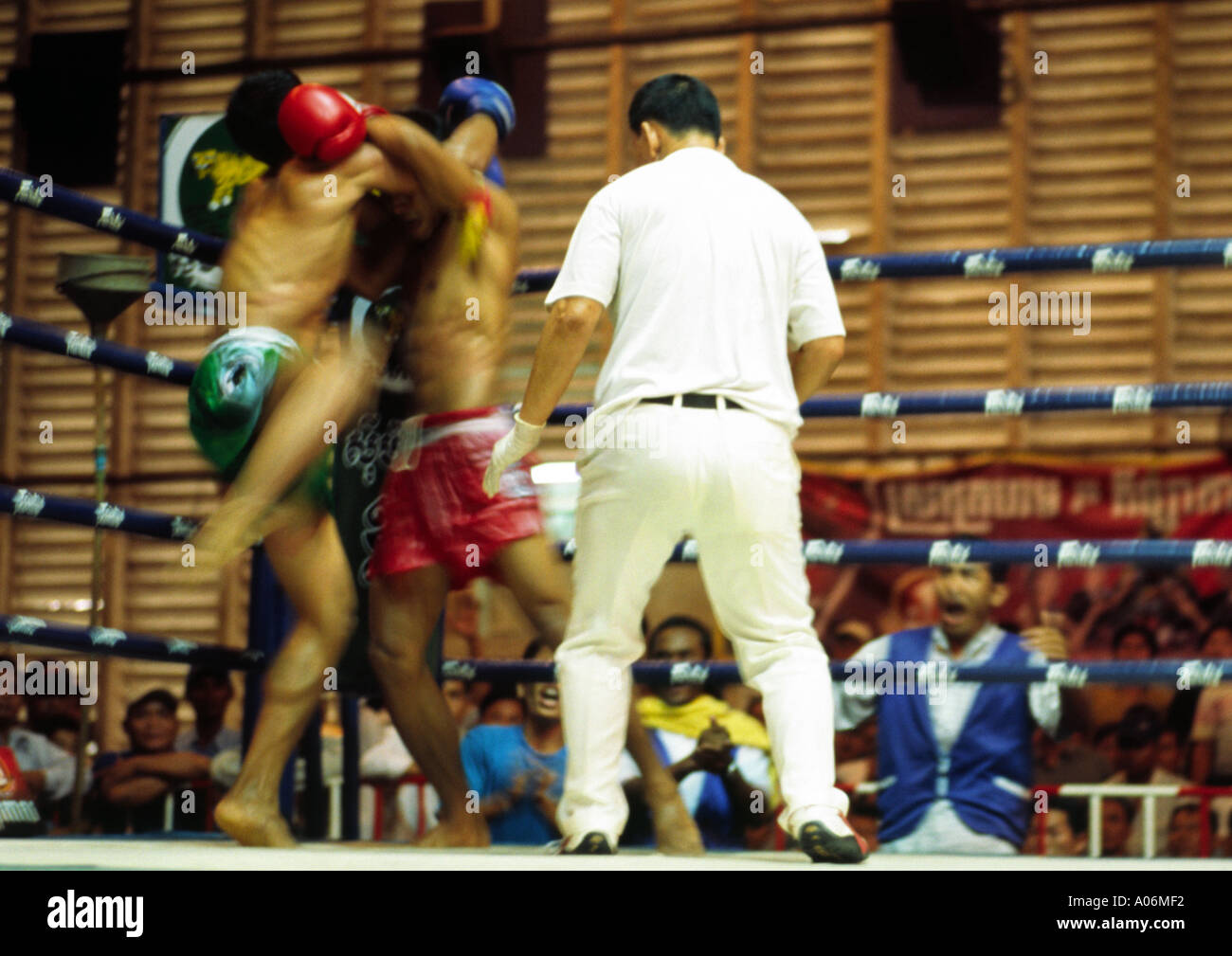 Khmer Kick Boxers clash in the ring at a match in Phnom Penh Cambodia ...