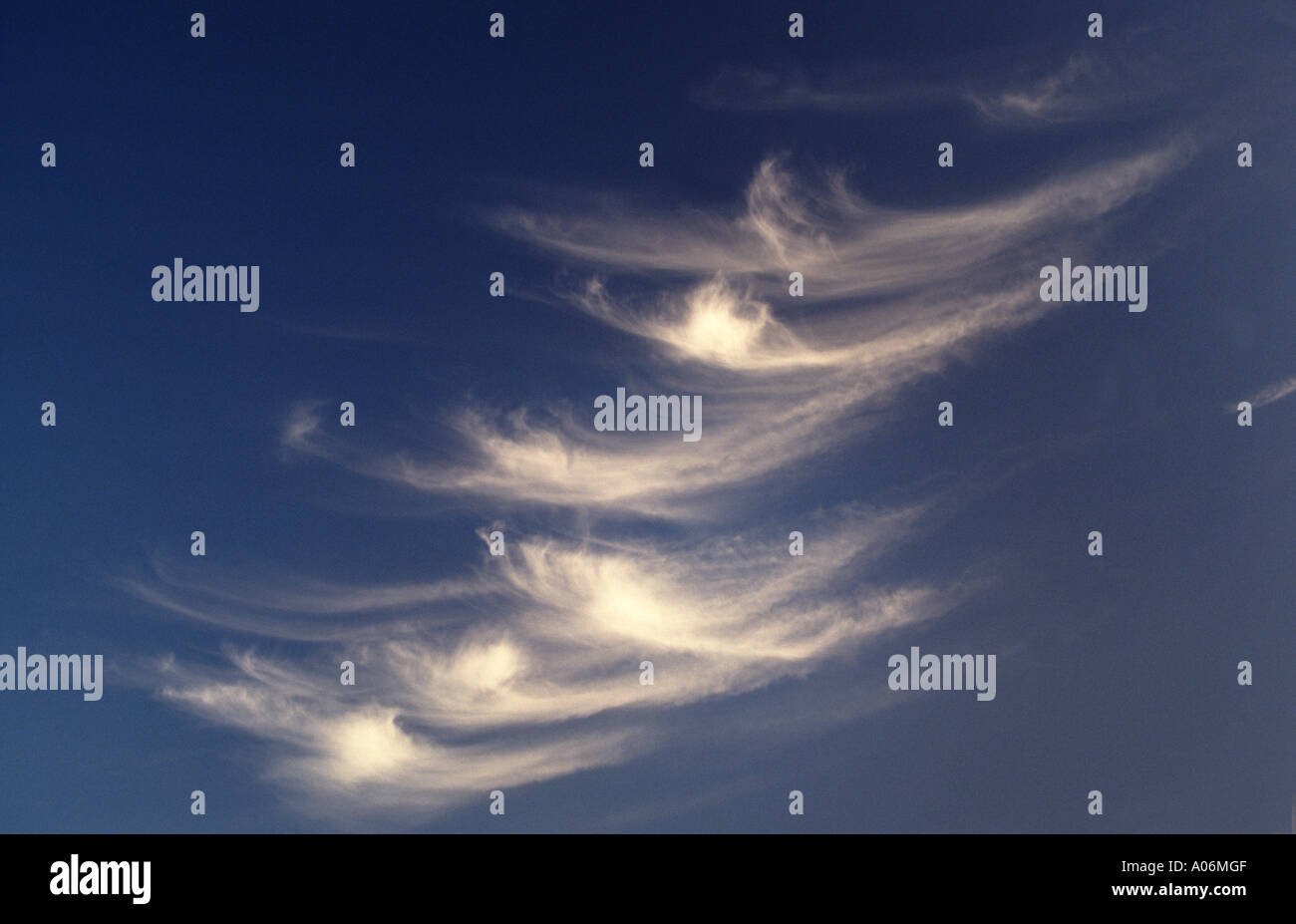Mares tail clouds in blue sky Stock Photo - Alamy